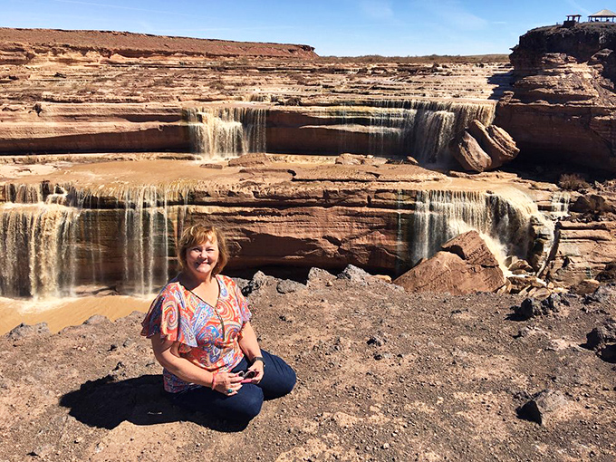 Picture-perfect moment captured. When the falls flow, visitors find countless angles to frame this improbable desert waterfall against red rock backdrops.