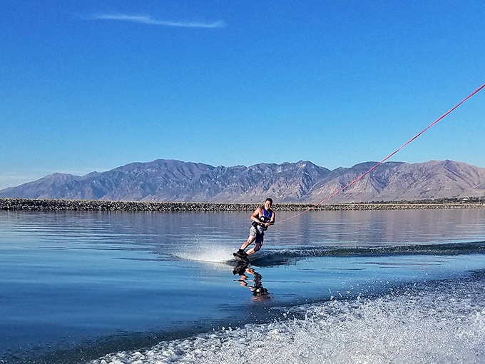 Water skiing with a mountain backdrop&mdash;where each spray of water catches sunlight like diamonds and your worries can't keep up with your speed.