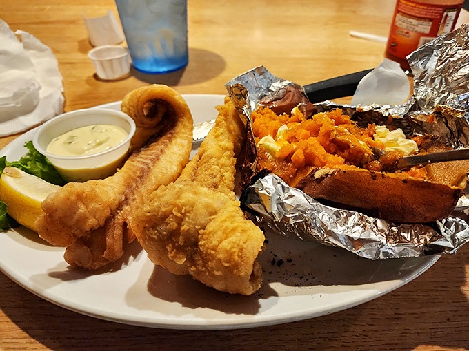 Golden-battered walleye and a loaded baked potato&mdash;proof that Michigan's lakes contribute as much to the menu as its pastures.