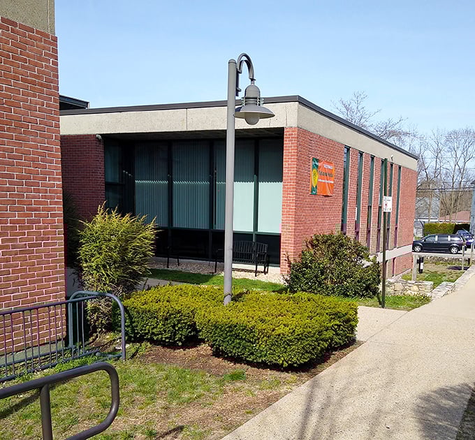 West Warwick's Public Library&mdash;where knowledge, community service, and thoughtful landscaping come together in perfect small-town harmony.