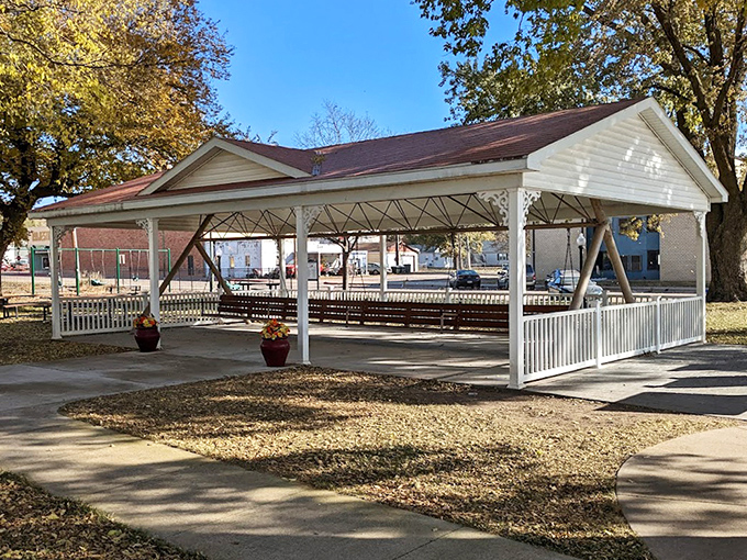 Classic white pavilion housing an extraordinary attraction. The pitched roof and ornate trim create a picture-perfect frame for this record-breaking relaxation station.