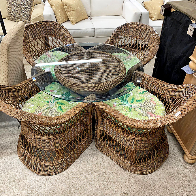 This wicker dining set with glass top practically begs for morning coffee and gossiping about the neighbors.