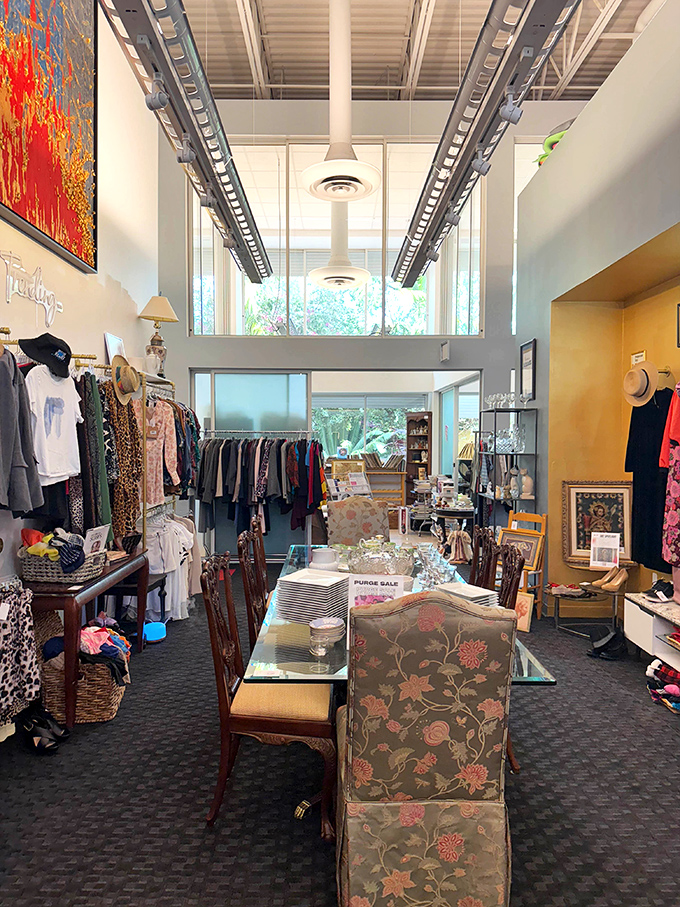 Sunlight streams through high windows, illuminating this cathedral of second chances where every item has a story to tell.