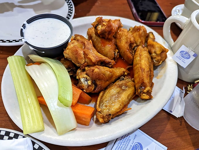Wings that don't need a sporting event as an excuse. Crispy, saucy, and served with the obligatory celery sticks nobody actually eats.