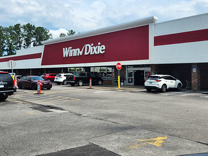 The Winn-Dixie might not be glamorous, but it's the social hub where neighbors catch up while debating which produce looks freshest today.