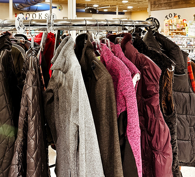 Winter coat wonderland where every garment tells a story. That pink beauty might have attended Broadway shows before landing here!