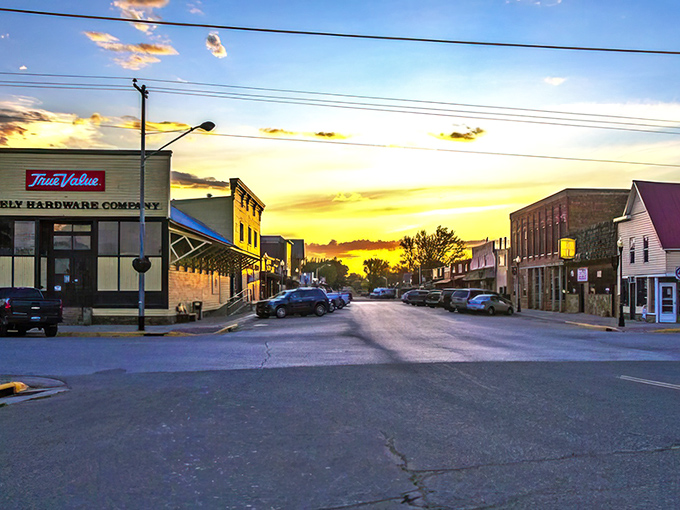 Sunset paints Saratoga's main street in gold, transforming an ordinary Wyoming town into something magical as day turns to dusk.