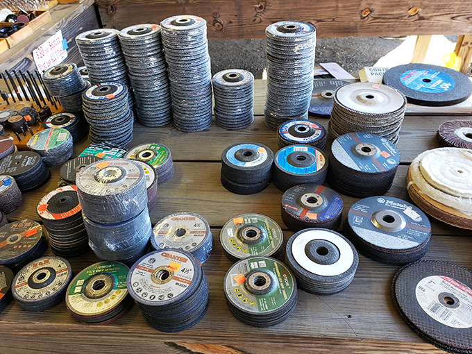 The hardware poetry of grinding discs stacked like industrial pancakes. Someone's workshop will soon be complete with these metal-cutting marvels.