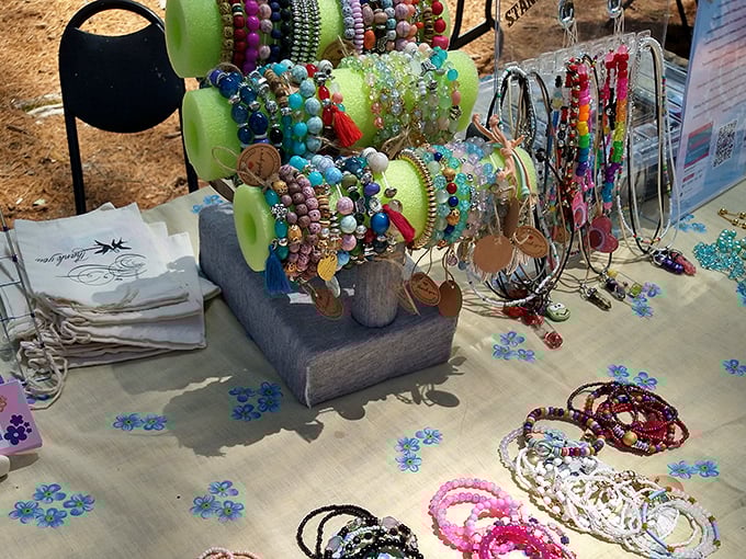 Colorful beads and handcrafted jewelry sparkle in the sunlight. Each piece offers wearable art at prices that make building a collection dangerously tempting.