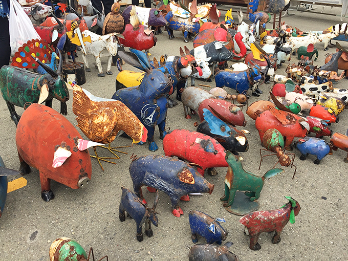 A menagerie of folk art animals creates a colorful carnival atmosphere. These whimsical creatures are just waiting to become conversation starters.