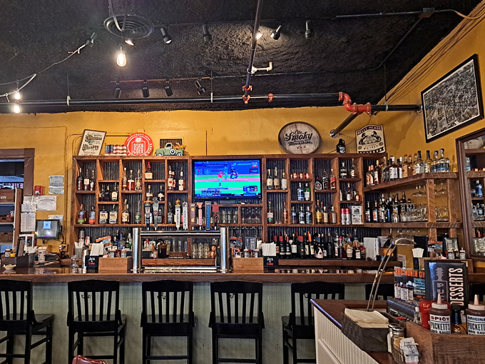 The bar doesn't just serve drinks; it tells stories. Each bottle and vintage sign a character in Franklin's ongoing tale of good times and better company.