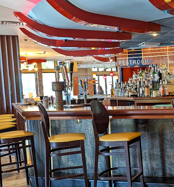 The bar area strikes that perfect balance between "fancy enough for a celebration" and "comfortable enough to become your regular spot."