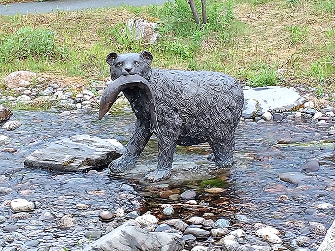 This bronze bear with his fresh catch seems to say, "Yes, I'm just a statue, but please keep your distance from my real-life cousins."