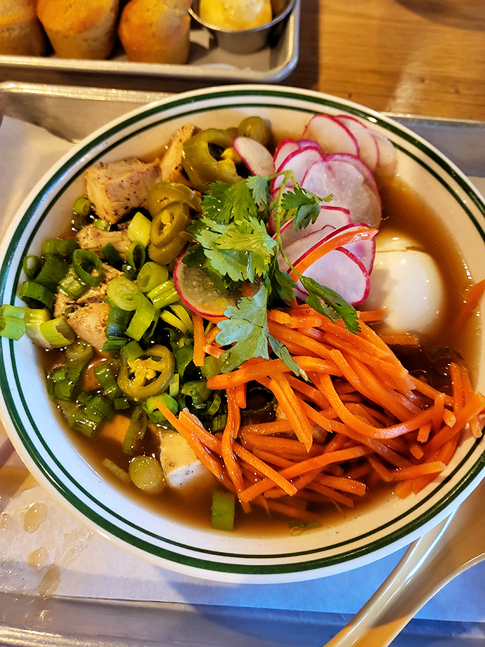 A bowl of comfort that warms from the inside out. Colorful vegetables and tender chicken swimming in broth that tastes like liquid sunshine.