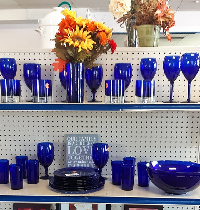 That cobalt blue collection! Someone's carefully curated glassware now waits for a new home and fresh flowers to bring it back to life.