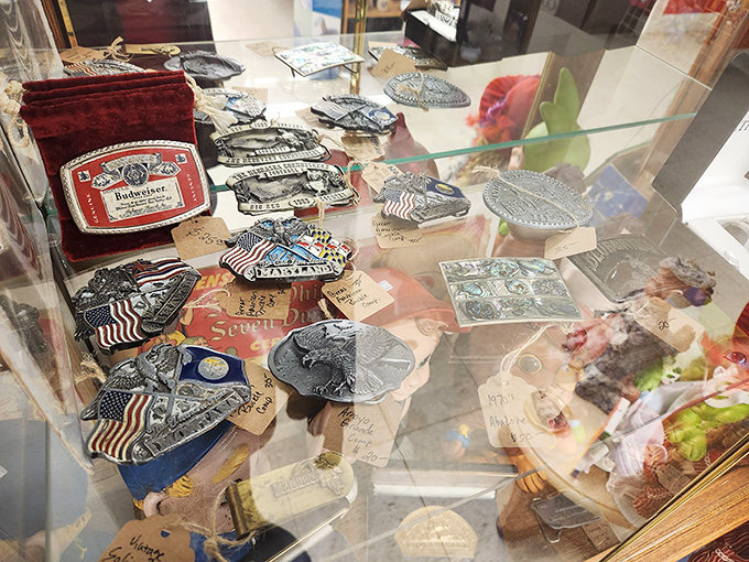 Belt buckles that tell stories louder than the people wearing them. That Budweiser one definitely attended some legendary tailgates.