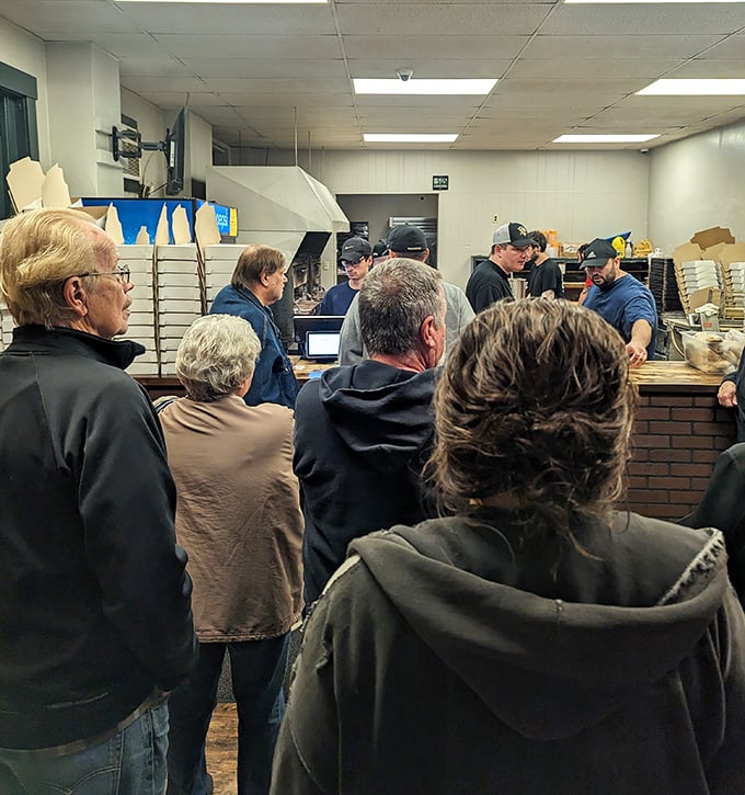 The line forms for a reason&mdash;locals know that good things come to those who wait, especially when it's for Police Station Pizza's legendary offerings.