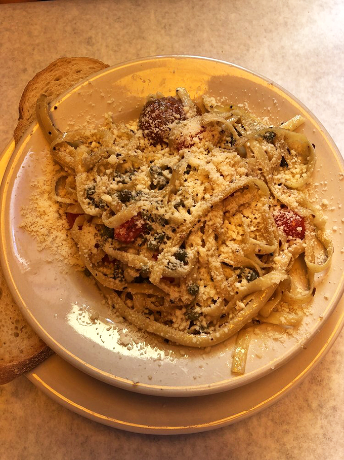 This pasta isn't just twirled on a plate&mdash;it's a tangle of homemade noodles performing a delicious balancing act with sauce and cheese.