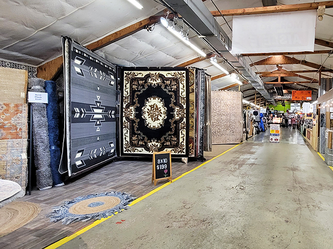 Oriental rugs displayed like art gallery pieces, each pattern whispering tales from distant lands and local living rooms.