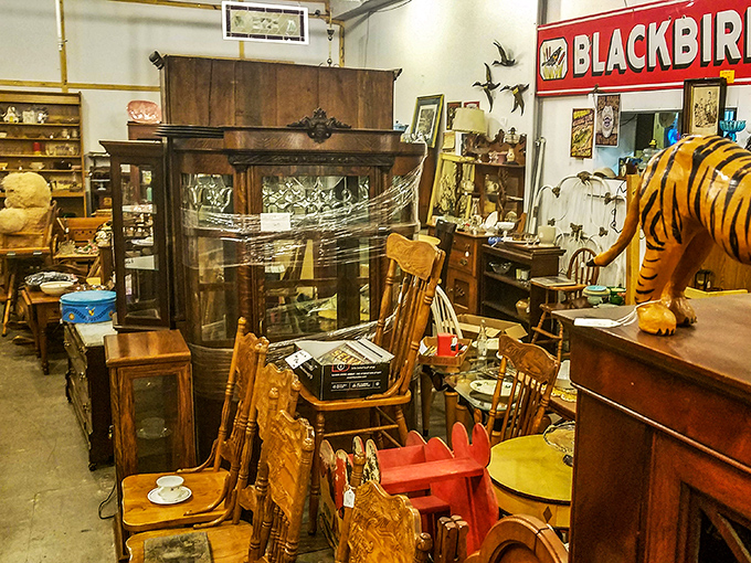 Wooden furniture from every era stands at attention, waiting for second chances in new Nebraska homes.
