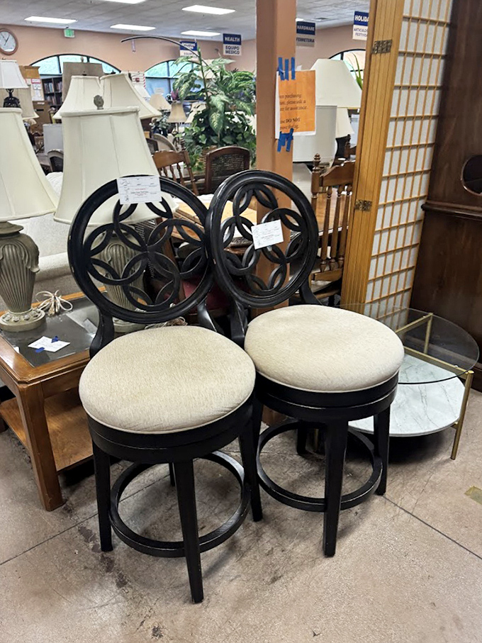 Elegant bar stools with decorative backs offer both style and substance. Imagine these beauties tucked under your kitchen island&mdash;instant upgrade!