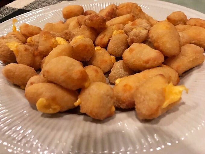 Wisconsin's unofficial state food: cheese curds. Golden, crispy outside; melty, squeaky inside&mdash;a textural contradiction that somehow makes perfect sense.