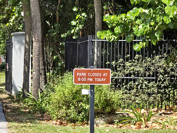 Even paradise has closing hours &ndash; this unassuming sign reminds visitors that even Eden operated on a schedule.