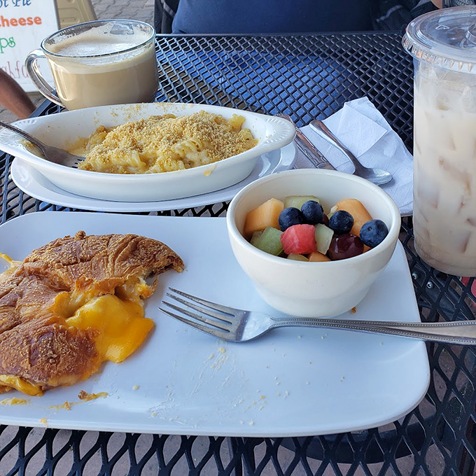 Fresh fruit nestled beside French toast – nature's way of making you feel virtuous about your indulgence.