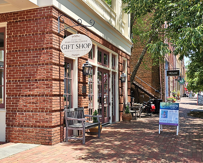 The International Storytelling Center's gift shop invites you in with its welcoming bench and brick facade. Stories aren't just told here—they're lived.