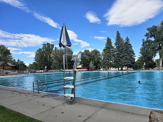 Buffalo's community pool &ndash; where "cloud computing" means calculating how long until that fluffy one overhead blocks the sun.