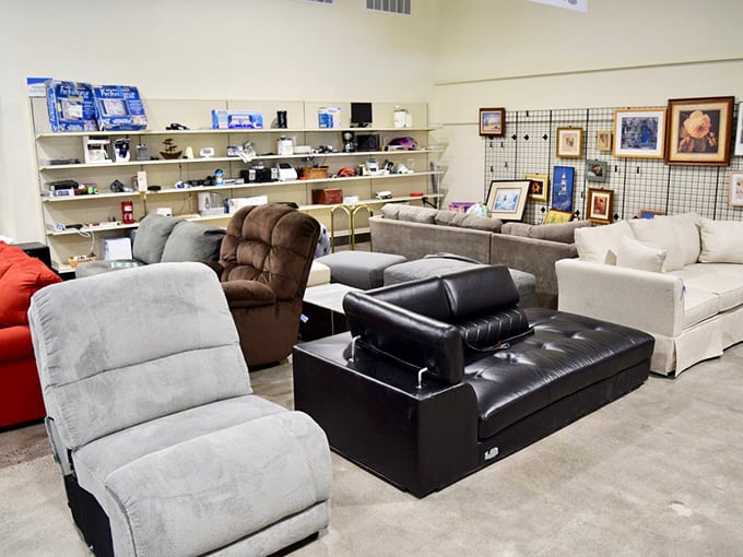 A sofa symphony in neutrals and statement pieces. That recliner is practically begging you to put your feet up and stay awhile.