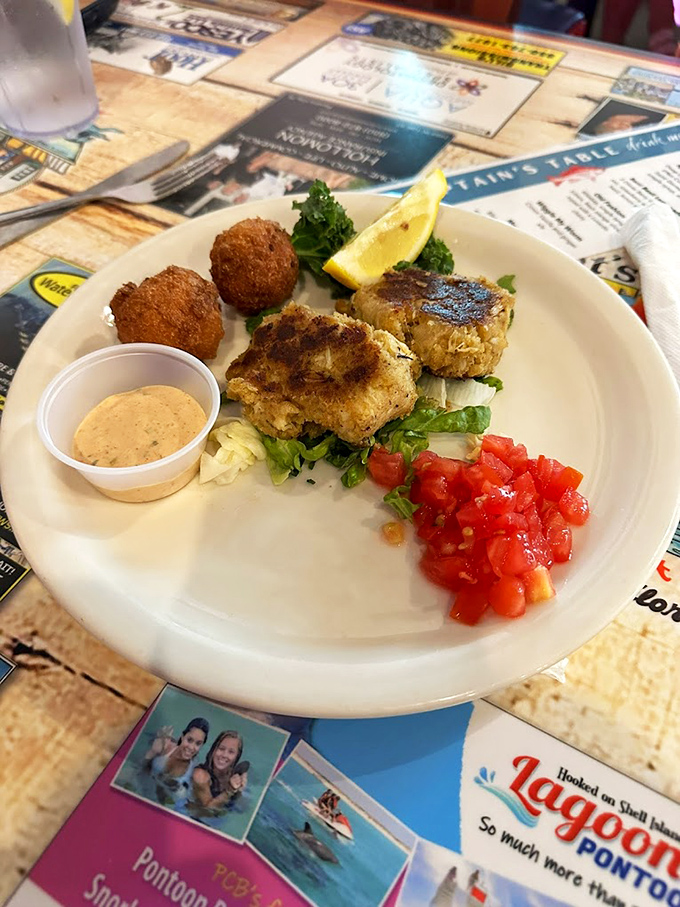 Crab cakes that are actually crab, not breadcrumbs with a hint of seafood. Served with a sauce that should be bottled and sold as liquid happiness.