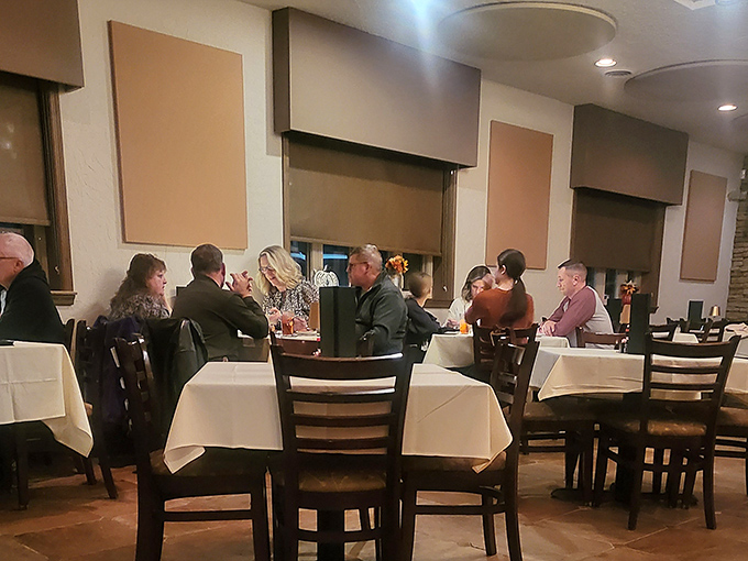 The dining room buzzes with the universal language of "mmm" and "you've got to try this," creating the soundtrack of satisfied customers.