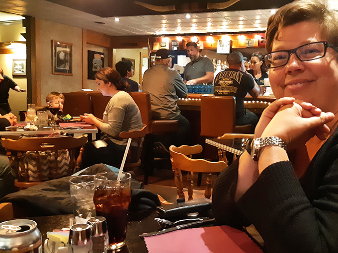 The dining room buzzes with the universal language of "mmm" while everyone pretends they're not eyeing each other's plates.