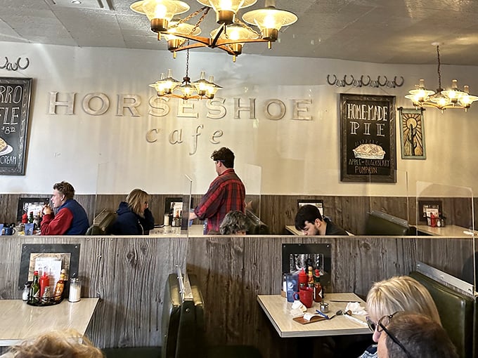 Classic diner seating where strangers become friends over coffee and conversations about Bellingham's changing skyline.