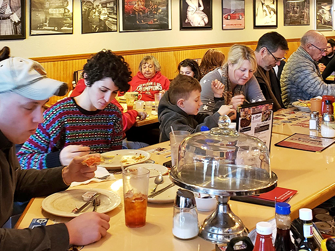 The true diner experience: families and friends gathered around tables, creating memories one forkful at a time.