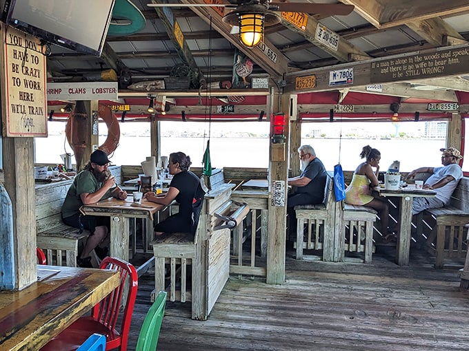 The outdoor deck at Hooper's: where strangers become friends over the shared language of crab-cracking techniques and vacation stories.
