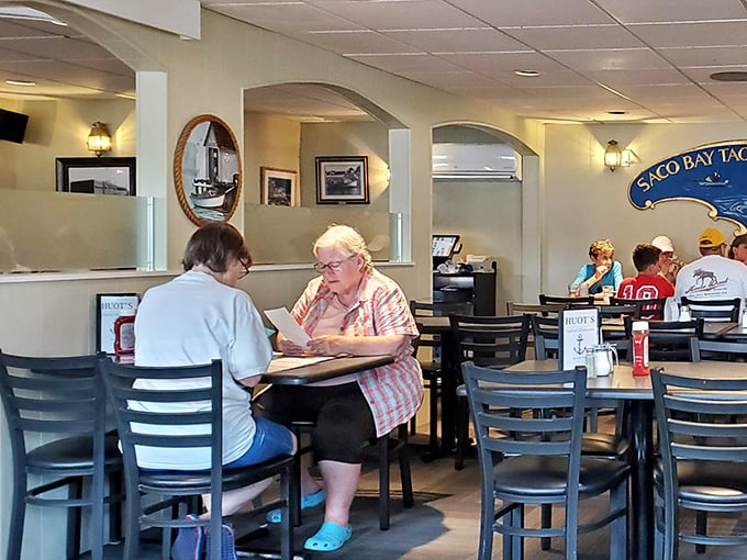 The true measure of a local spot: regulars who've been coming so long they don't even need to look at the menu.