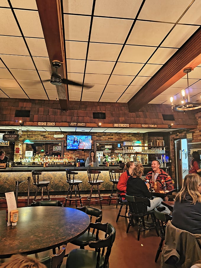 The kind of lively dining room where strangers become friends over shared slider recommendations and local beer selections.