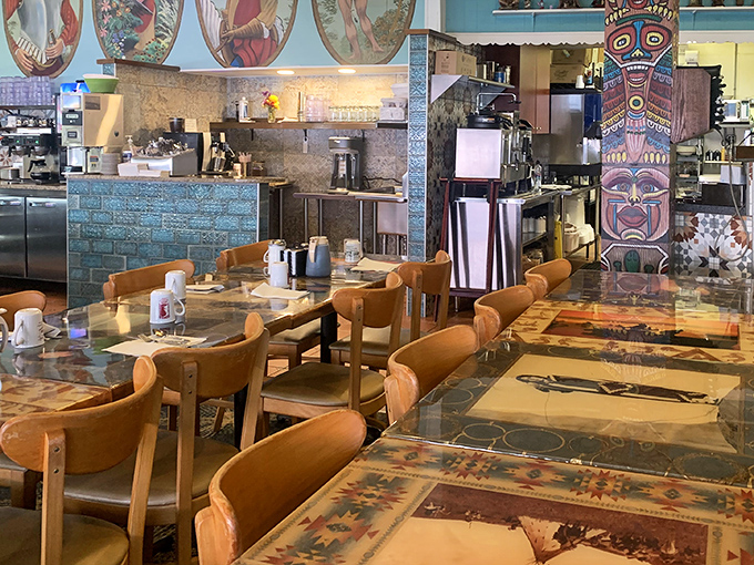 Wooden tables topped with historical imagery create the perfect setting for morning conversations that flow as freely as the coffee.