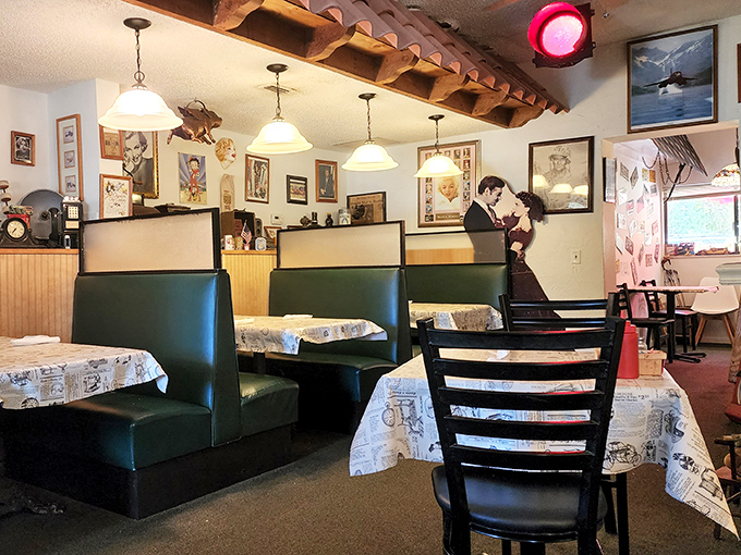 Green booth seating and vintage photographs create the perfect backdrop for conversations that inevitably begin with "You've got to try the..."