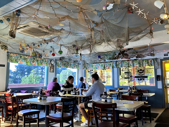 Dining under fishing nets and twinkling lights &ndash; it's like eating inside a whimsical underwater cave, minus the wetsuit requirement.