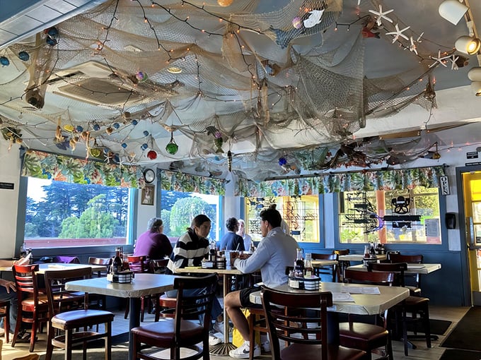 Dining under fishing nets and twinkling lights &ndash; it's like eating inside a whimsical underwater cave, minus the wetsuit requirement.