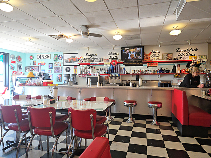 The counter where breakfast dreams come true. Those red stools have heard more town gossip than any therapist in Hudson.