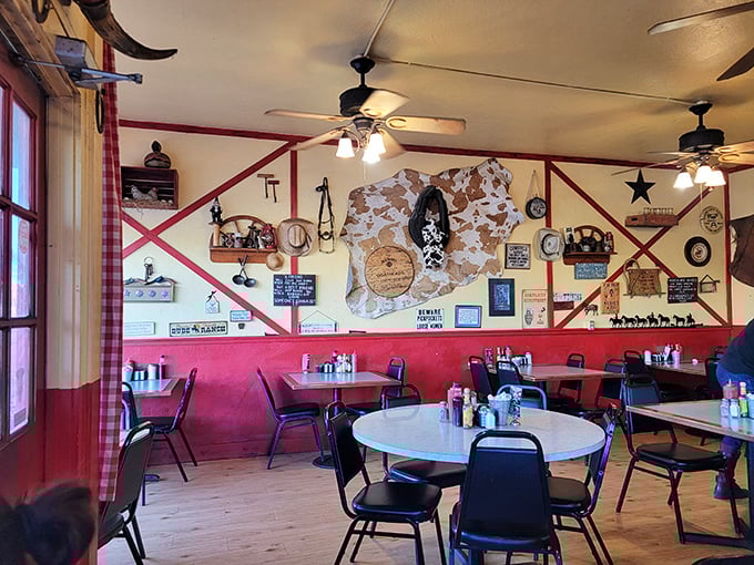 Red walls adorned with western memorabilia create the perfect backdrop for hearty meals and heartier conversations. Every item tells a story of Arizona's frontier past.