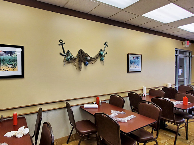 Fishing nets and anchors adorn walls where conversations flow as easily as the sweet tea refills.