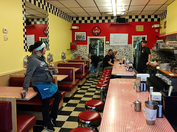 The black and white checkered floor isn't trying to be retro&mdash;it actually remembers when "retro" was just called "new." That's authentic diner DNA. Photo