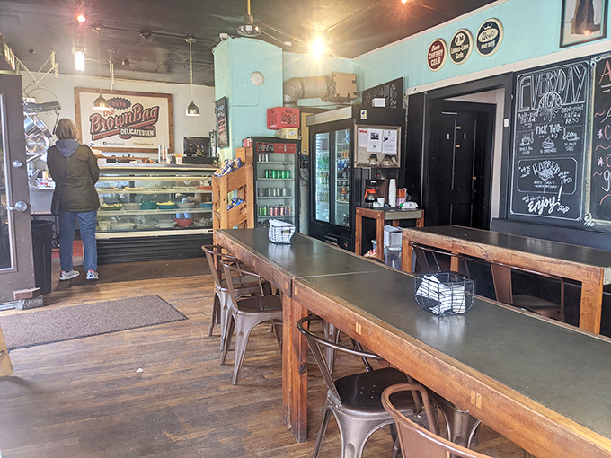 Simple wooden tables that have witnessed countless "first bite faces"&mdash;that expression when someone realizes they've found their new favorite sandwich spot. 