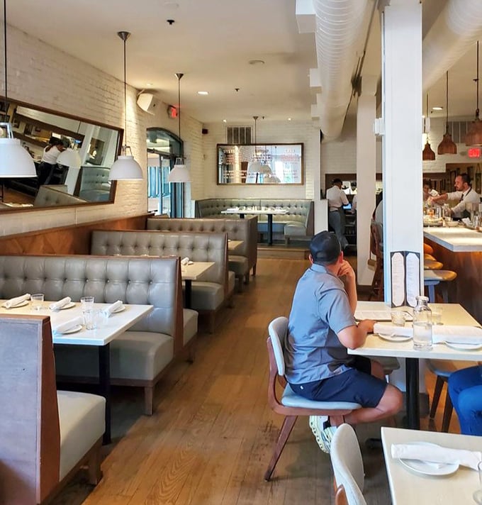Booth seating that invites lingering conversations and second desserts, because leaving too quickly would be downright disrespectful to this experience.
