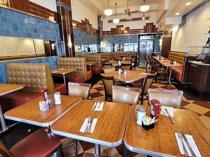 The dining area's wood-paneled warmth and cushioned booths promise the kind of comfort that makes you linger over that last bite of pie.